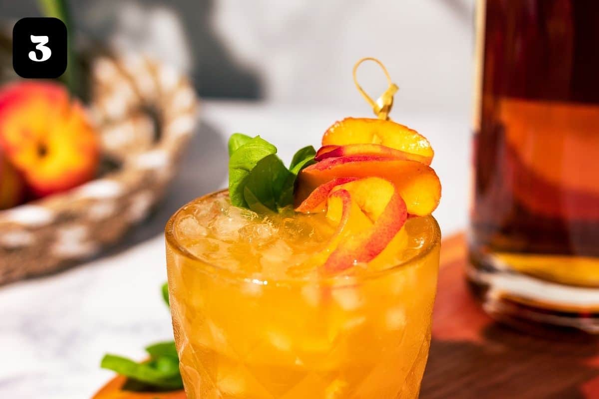 Peach Bourbon Whiskey Smash Cocktail with Basil - A Grateful Meal