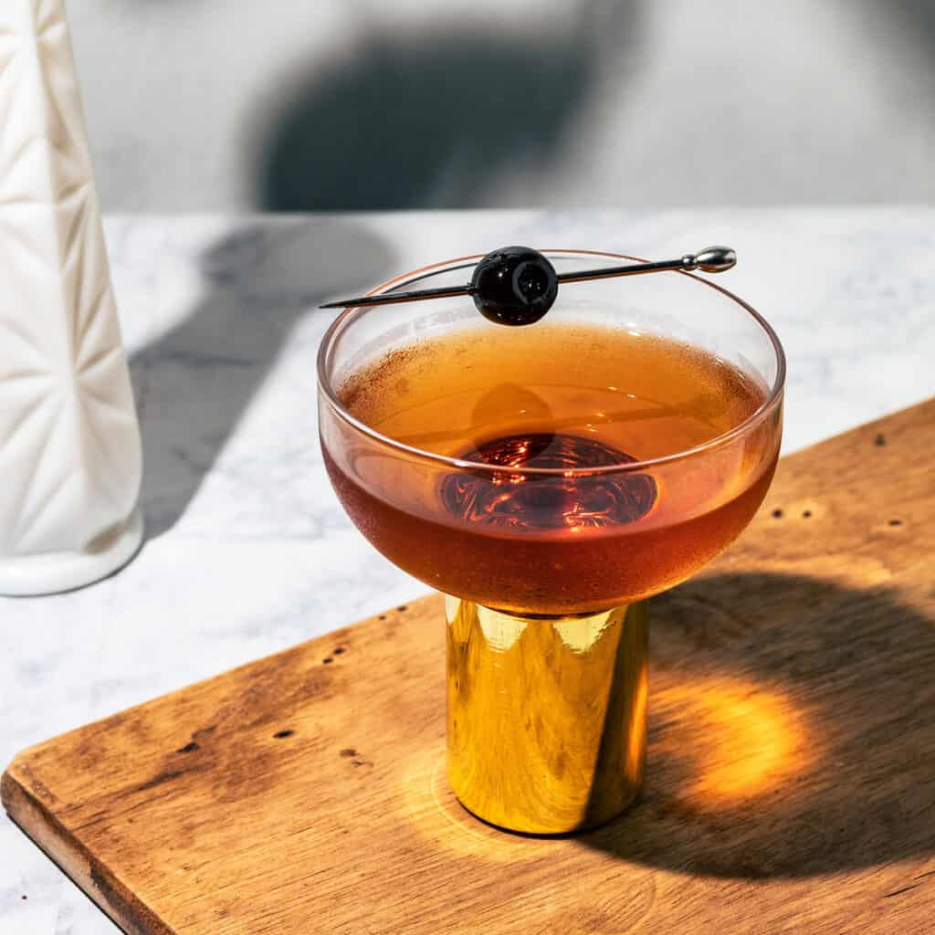 Peach Bourbon Whiskey Smash Cocktail with Basil - A Grateful Meal